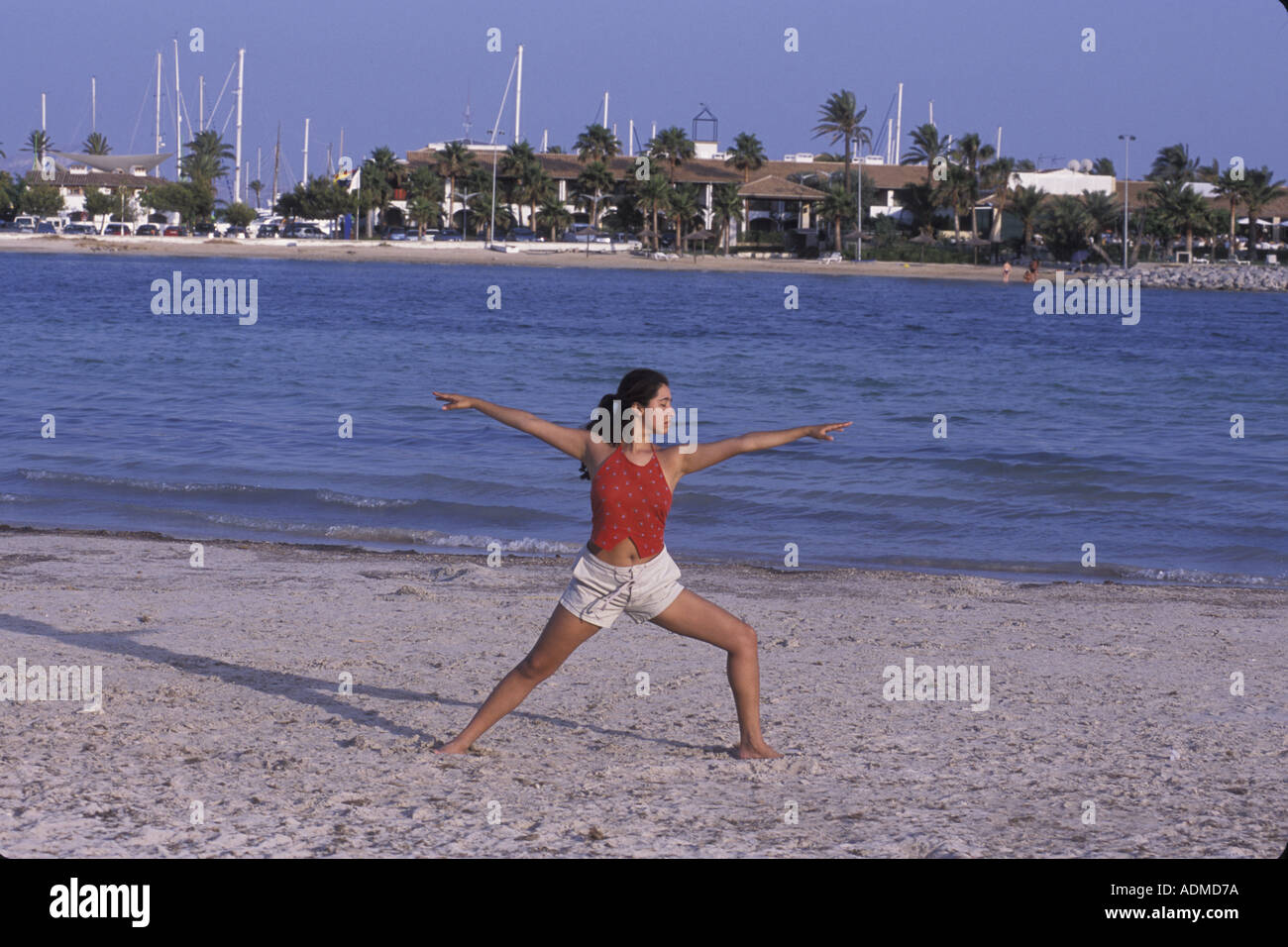26 years old latin woman model released doing Yoga on the beach Alcudia ...