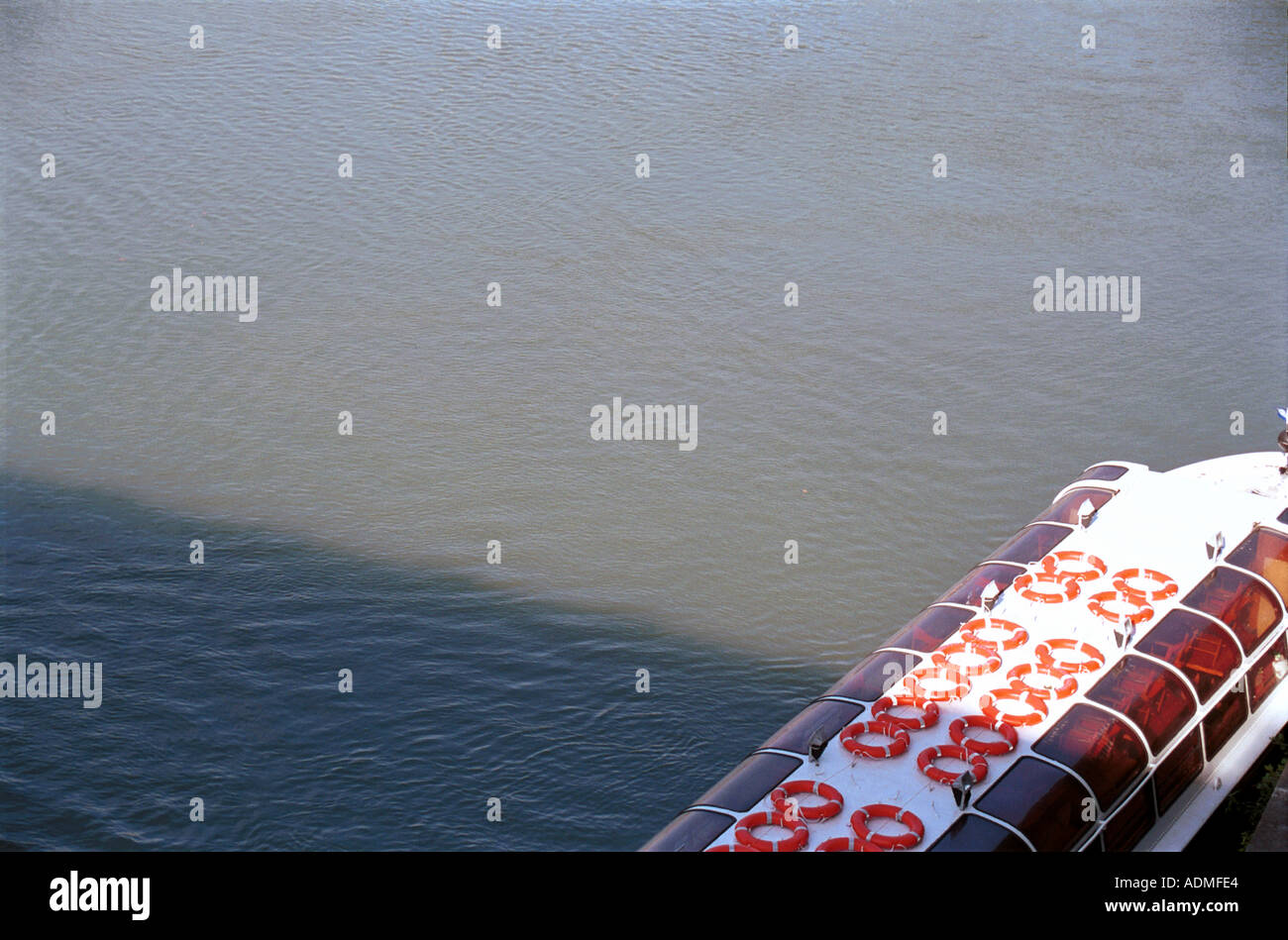tour boat with life rubber rings on river Stock Photo - Alamy