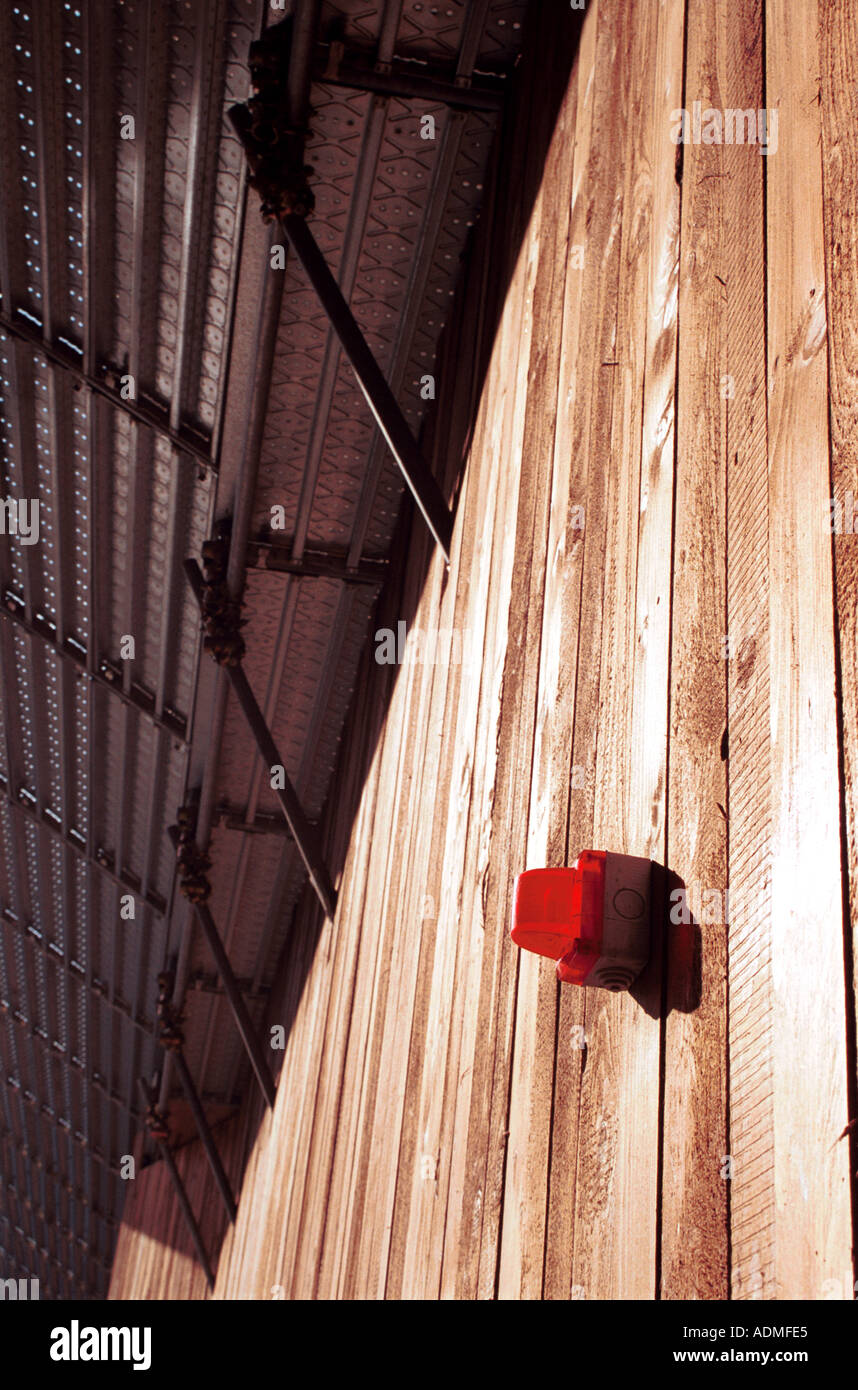 building site with scaffolding red warning light Stock Photo - Alamy