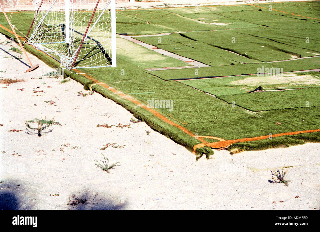 run down football pitch on beach Stock Photo - Alamy