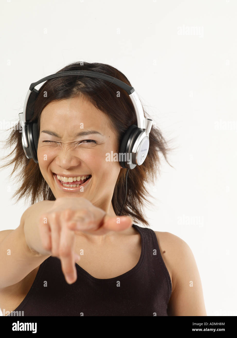 Woman with headphones dancing Stock Photo - Alamy