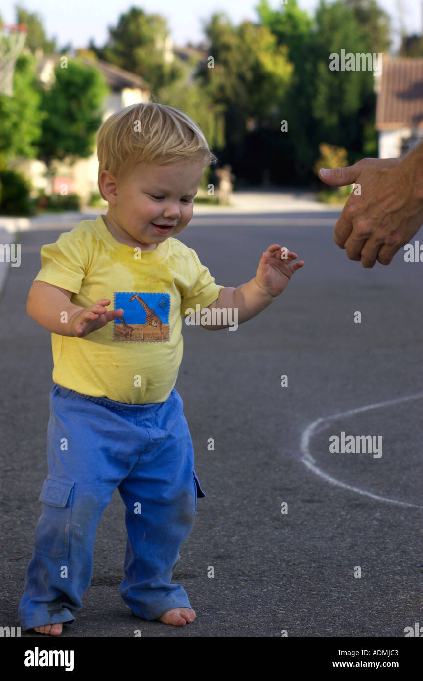 toddler first walking steps Stock Photo - Alamy