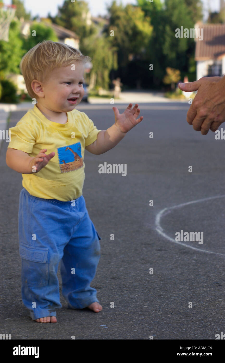 toddler learning to walk Stock Photo - Alamy