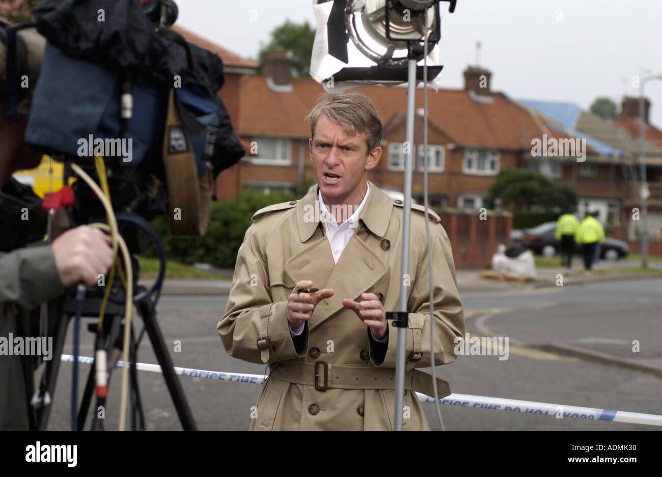 A CNN reporter covering the Birmingham terrorist story, 2005 Stock ...