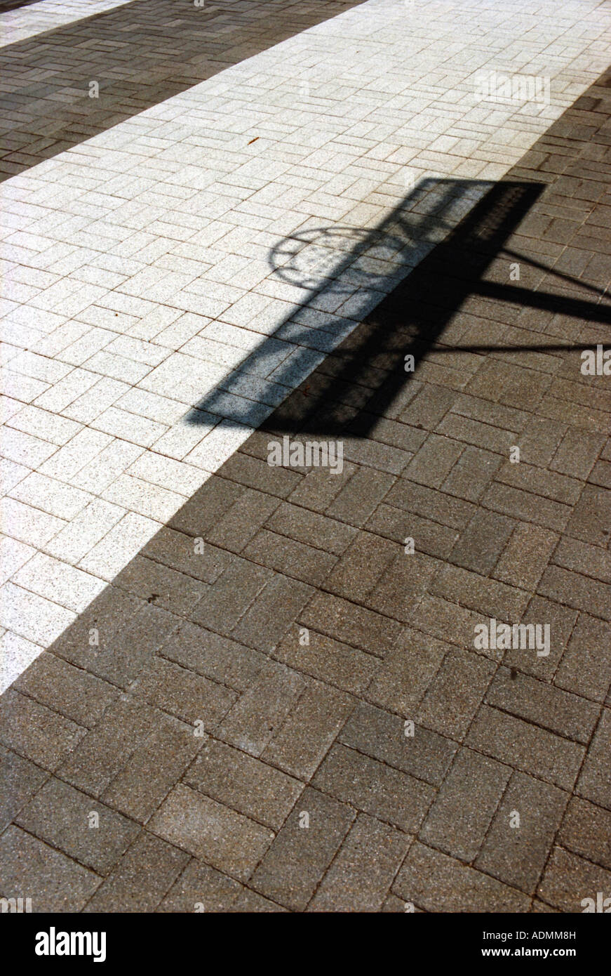 Shadow of basketball hoop on floor Stock Photo - Alamy