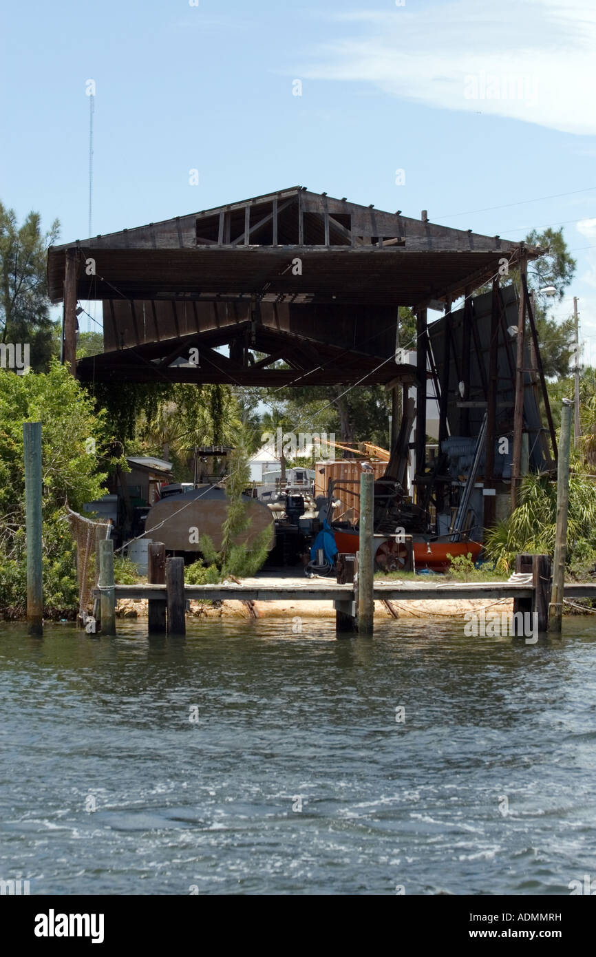 Old Decrepit Boat Storage Shed on the Edge of the Water Stock Photo - Alamy