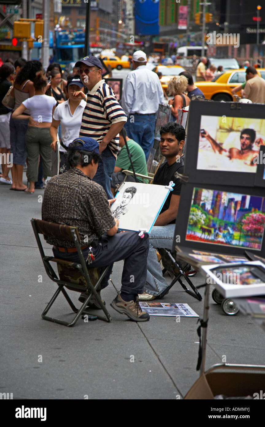 Street artist in Times Square drawing a tourist Stock Photo - Alamy