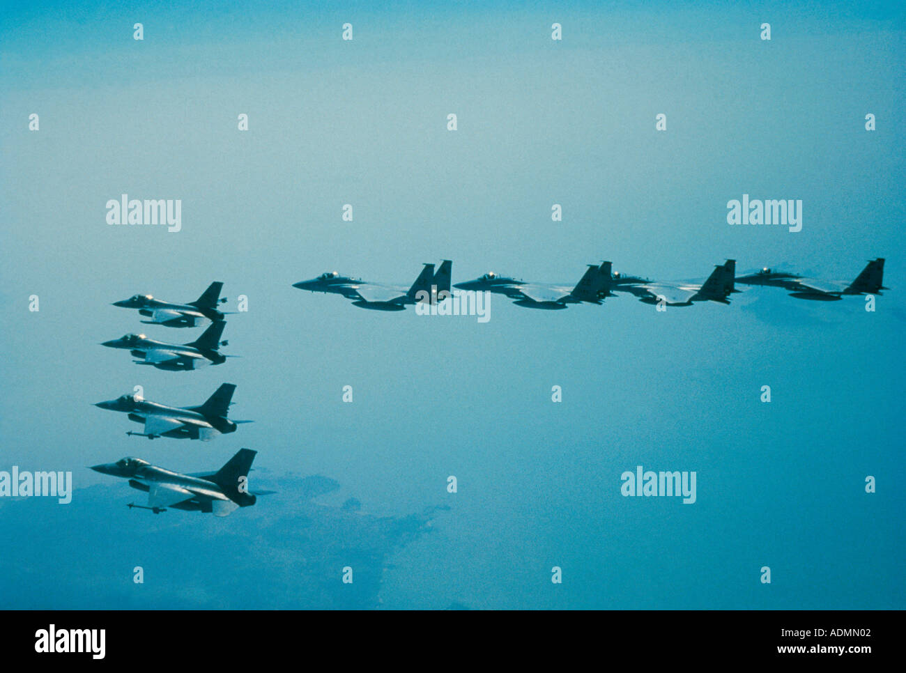 Aerial view of F-15 Eagle fighter planes flying in formation Stock ...