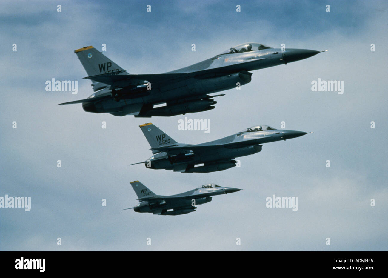 Low angle view of three F-16 Fighting Falcons flying in formation Stock ...