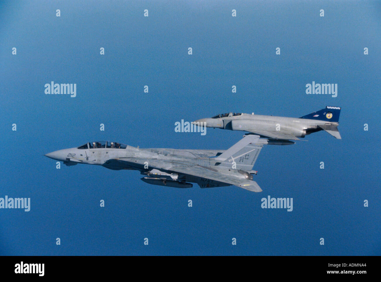 Low angle view of US Navy F-14A Tomacat and British RAF Phantom II ...