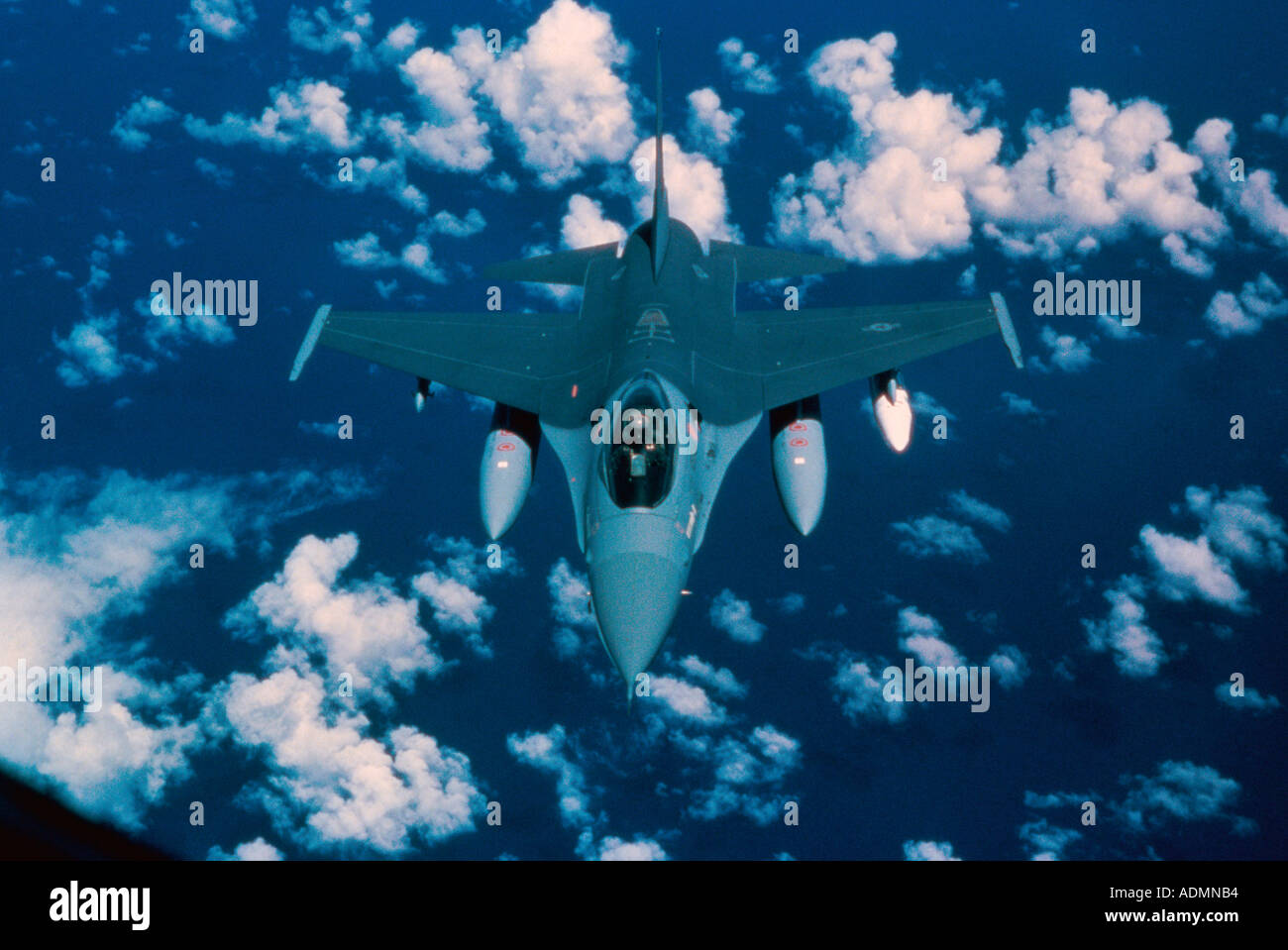 Aerial view of an F-16 Fighting Falcon in flight Stock Photo - Alamy