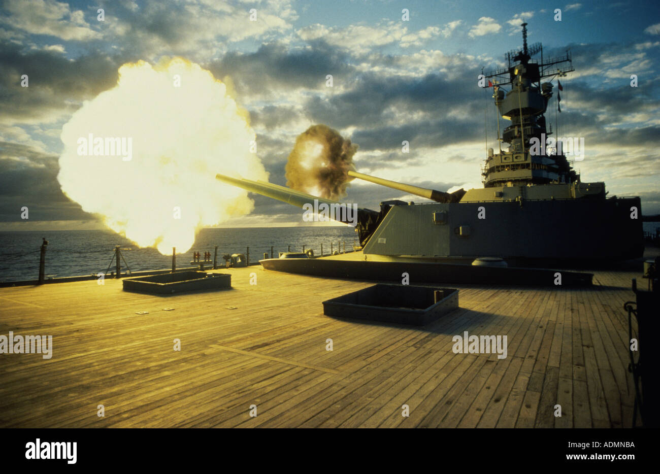 Guns firing from the USS Iowa Stock Photo - Alamy