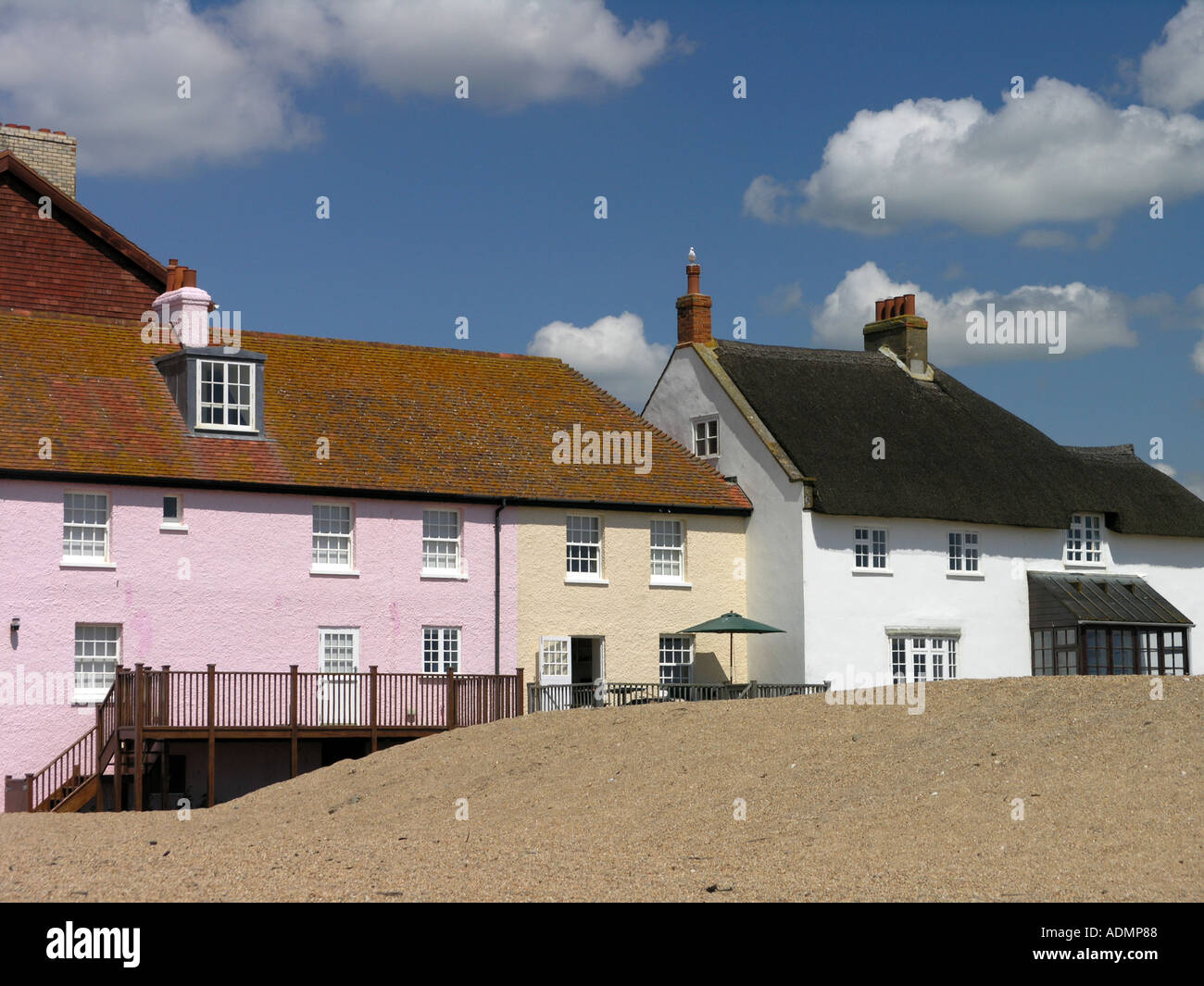Cottage on the pebble beach at West Bay Dorset Stock Photo - Alamy