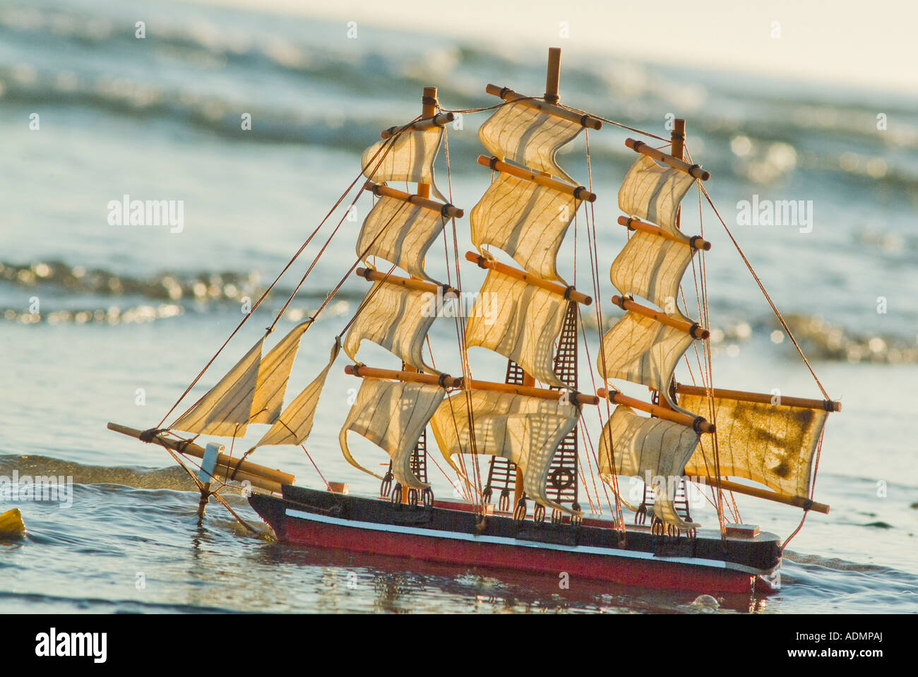 Three masted sailing ship floating on ocean Stock Photo - Alamy
