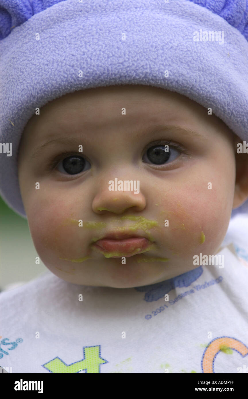 baby face with food all over Stock Photo - Alamy