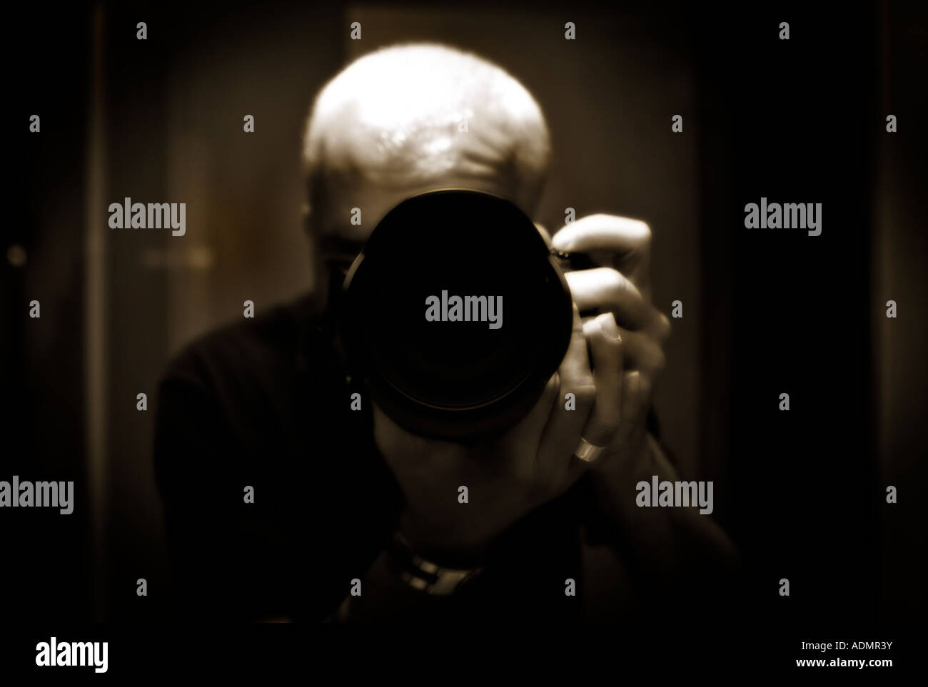 Self-portrait in a looking glass Stock Photo - Alamy