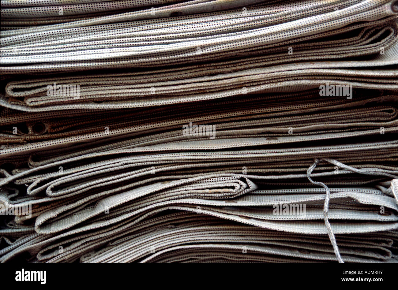 Stack of woven fabric Stock Photo - Alamy