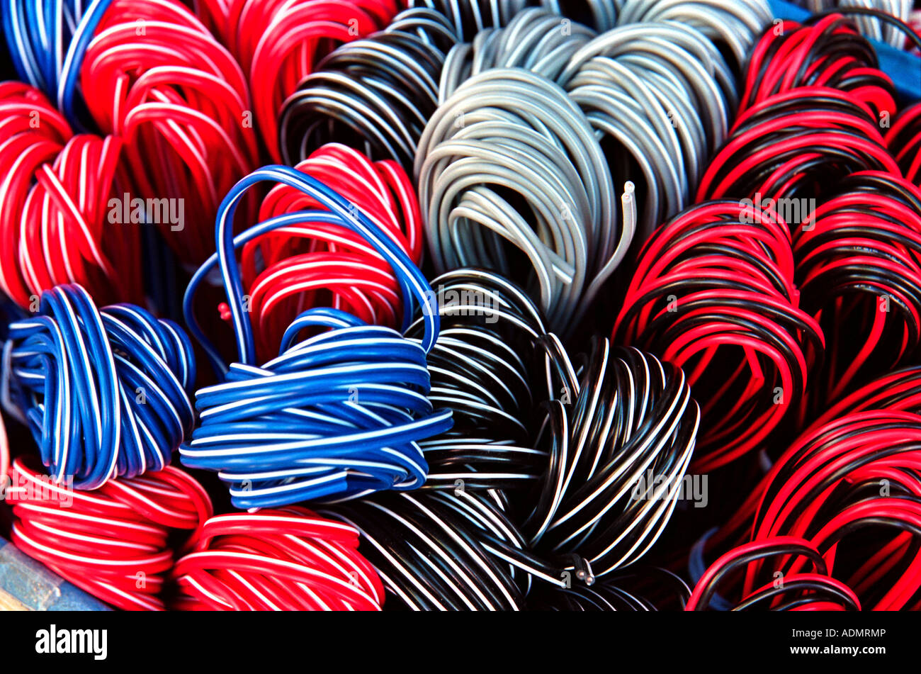 Red blue and grey wire cords Stock Photo - Alamy