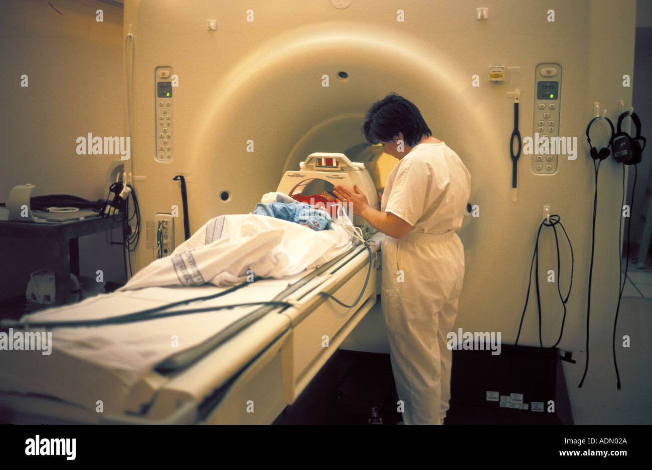 Magnetic Resonance Imaging MRI machine being used to scan and diagnose ...
