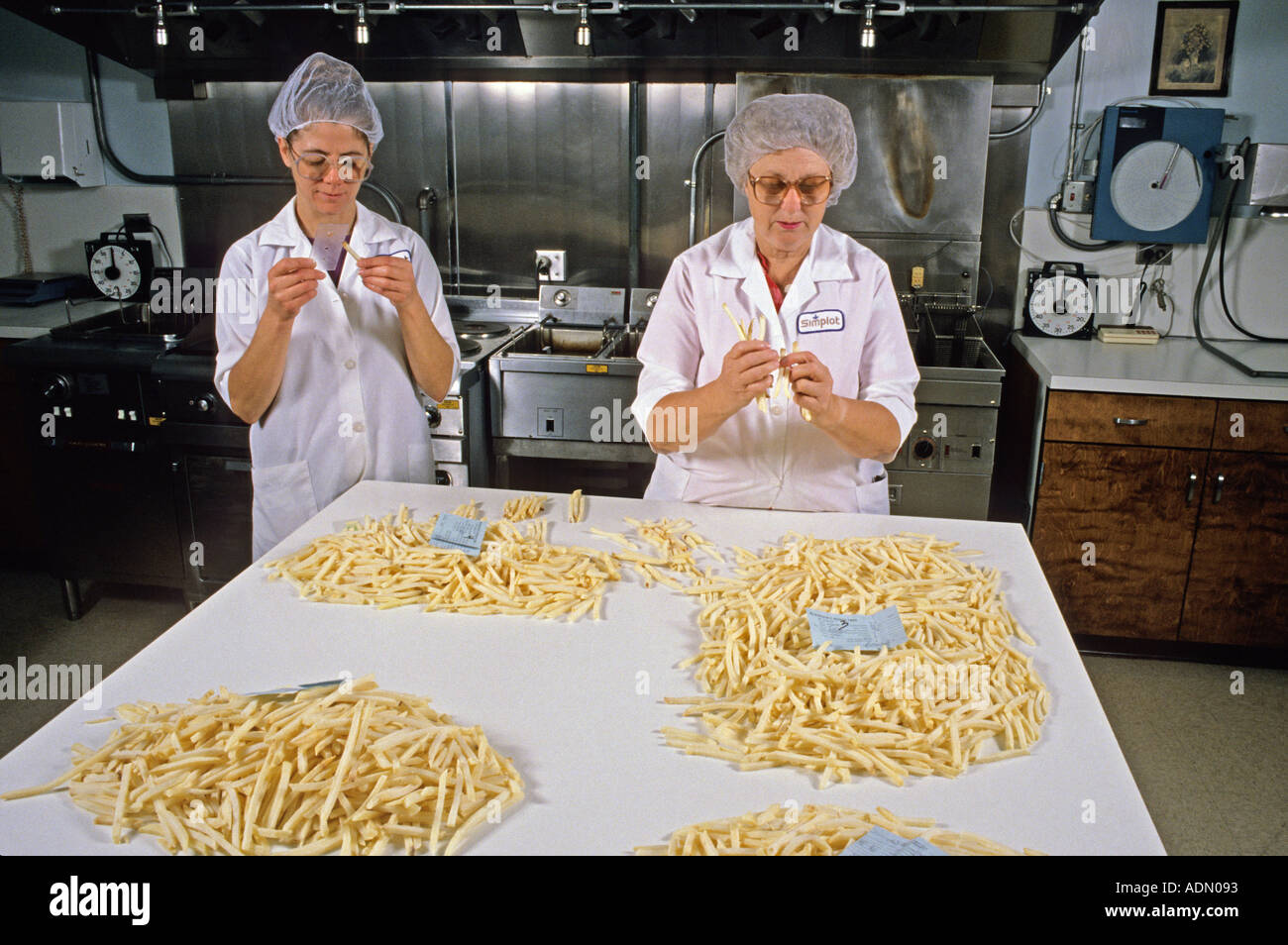 French fry quality control at a potato processing plant in Idaho Stock ...