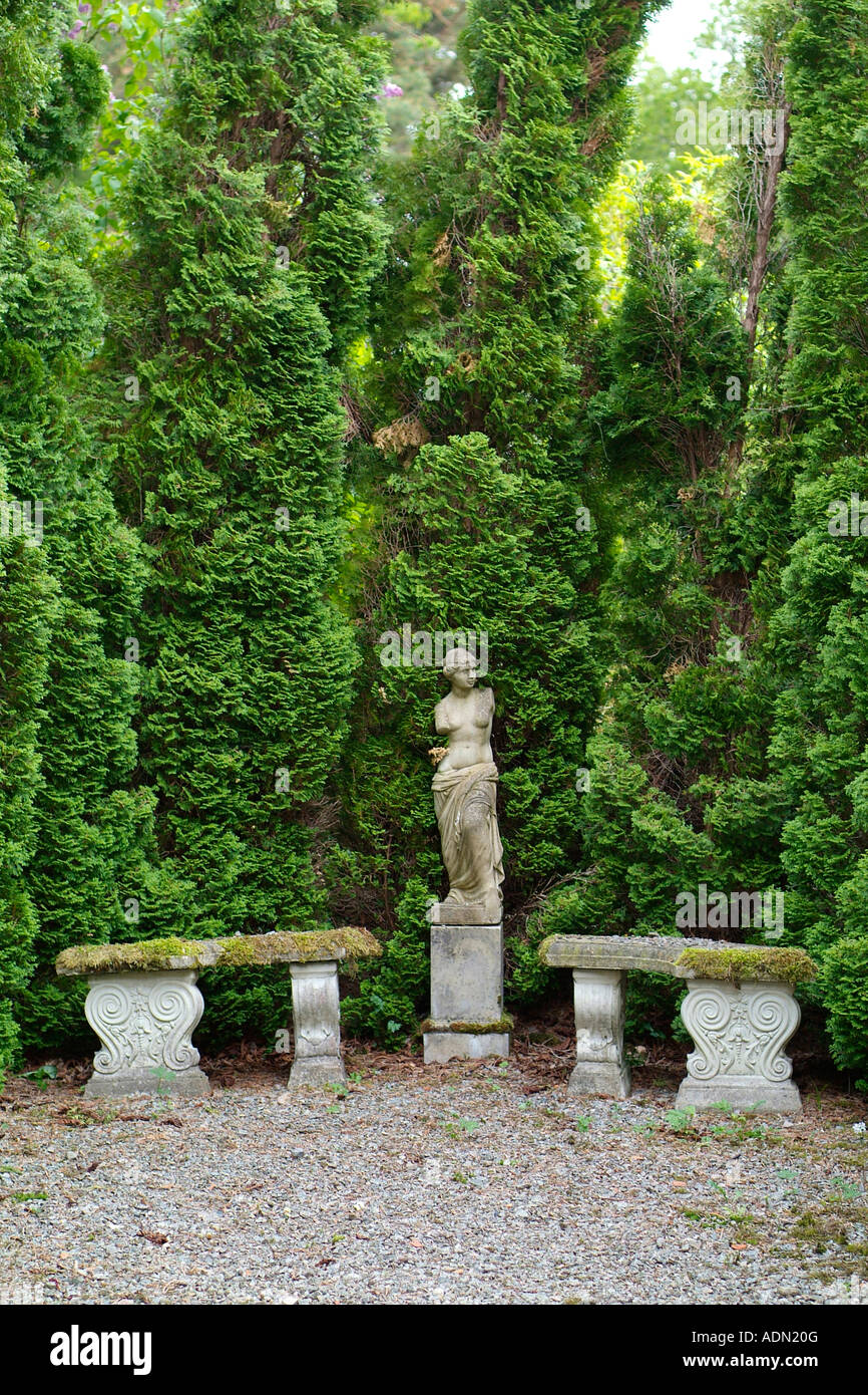 Small Venus from Milo style statue and two small benches Stock Photo ...
