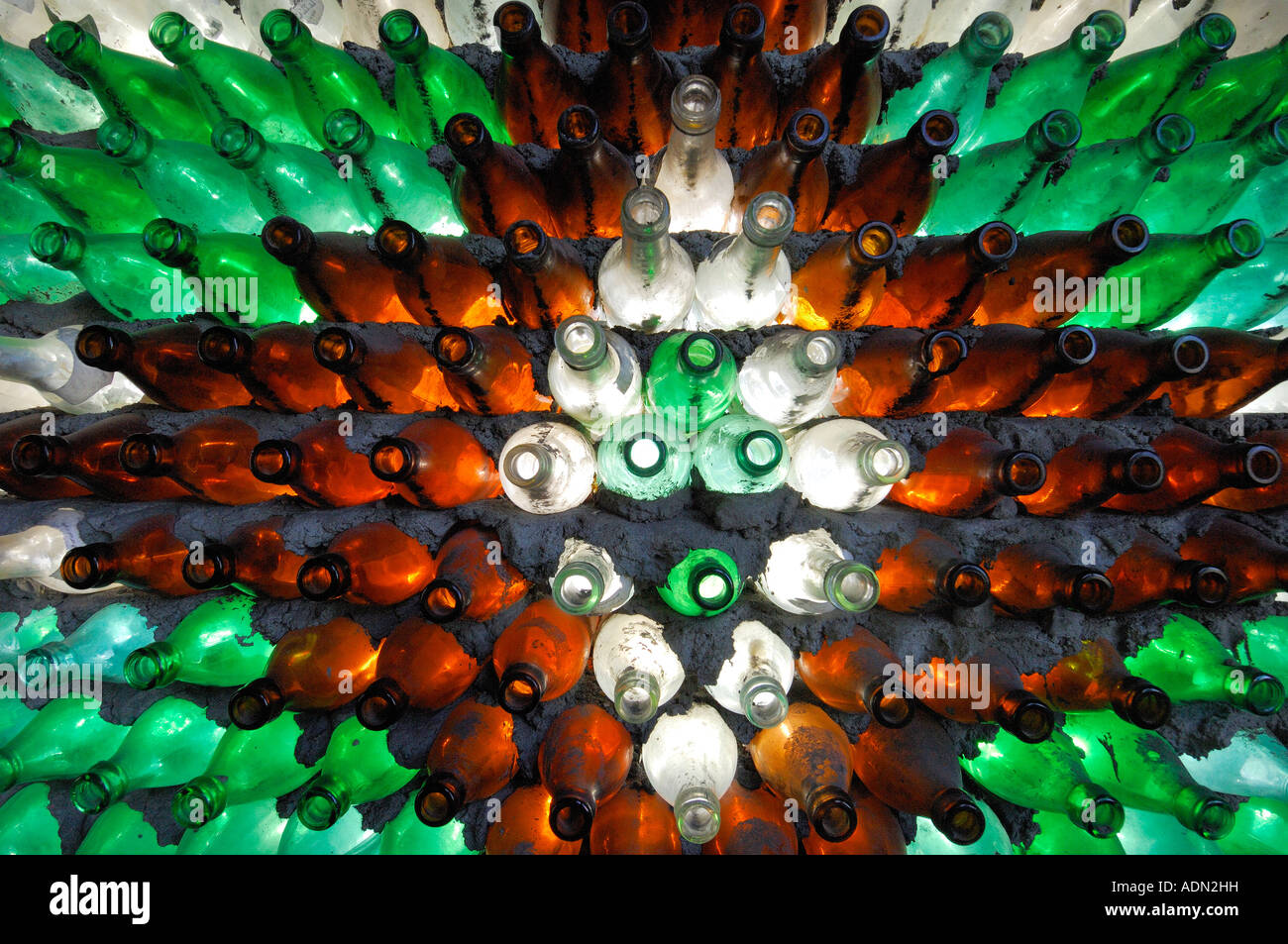 Many coloured bottles form a figure like a star Stock Photo - Alamy