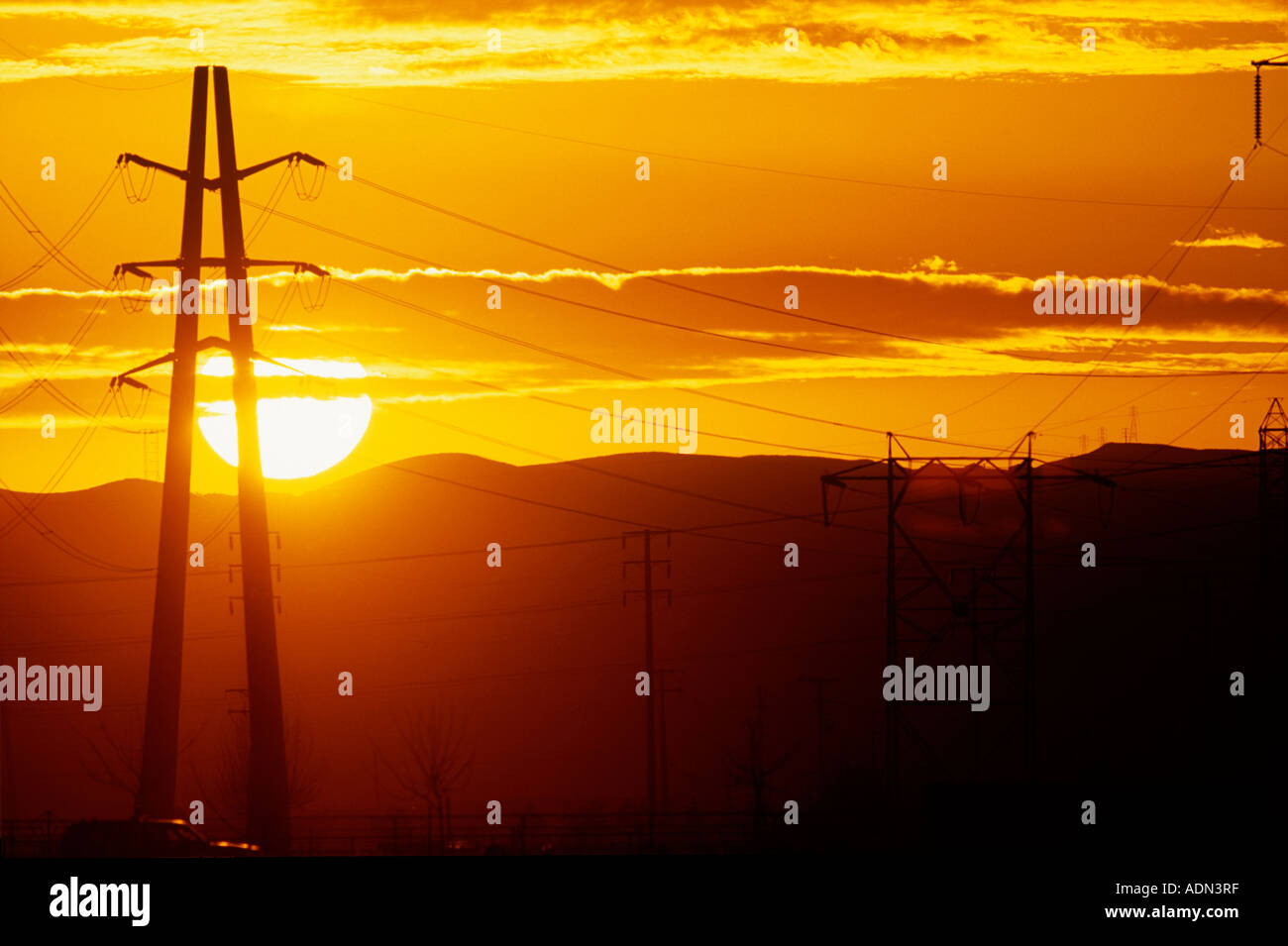 power pole Powerlines stretch over southern california in the sunset ...