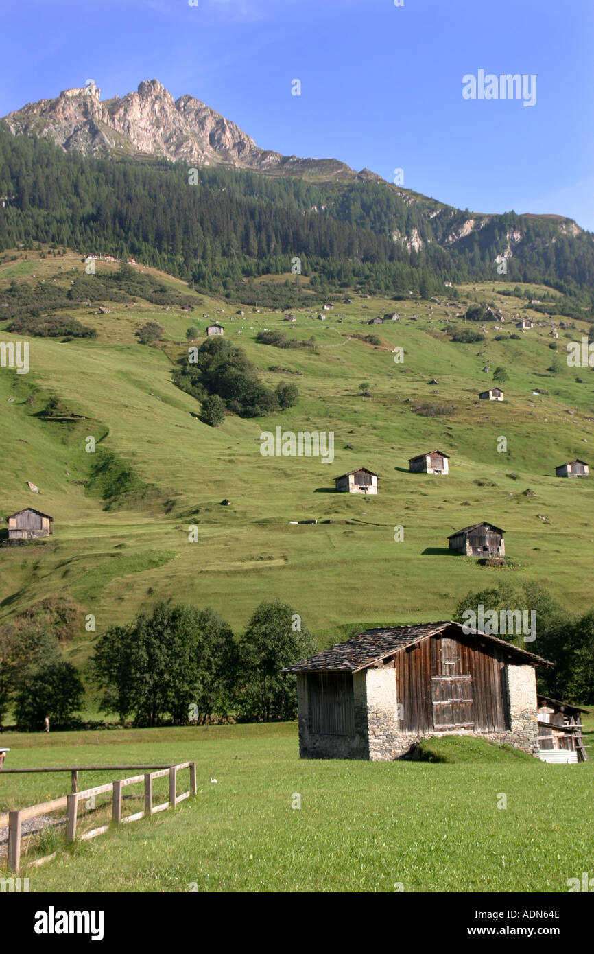 Mountain range Swiss Alps - Vals Terme - Swiss Cottages Stock Photo - Alamy