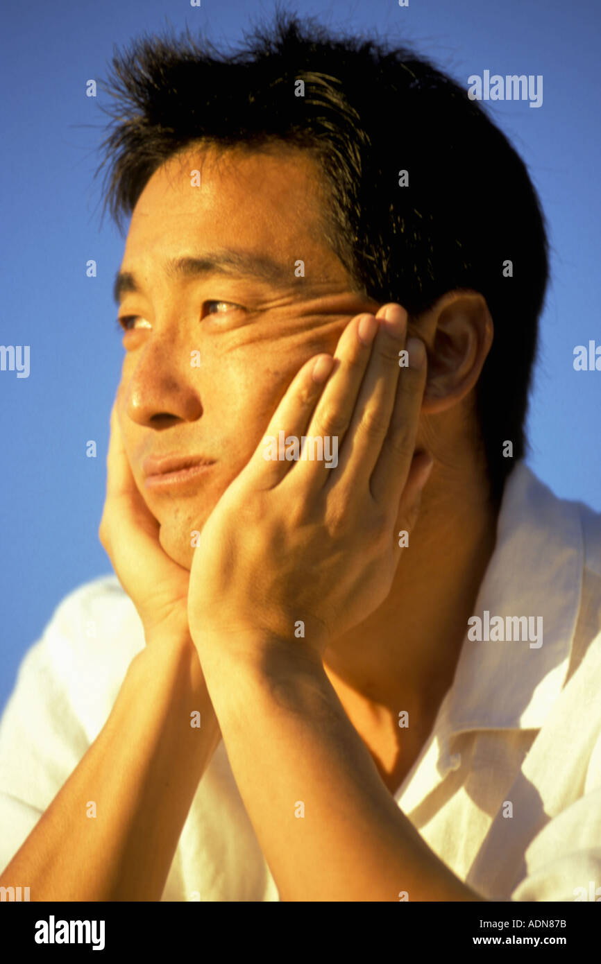 Cupping chin hi-res stock photography and images - Alamy