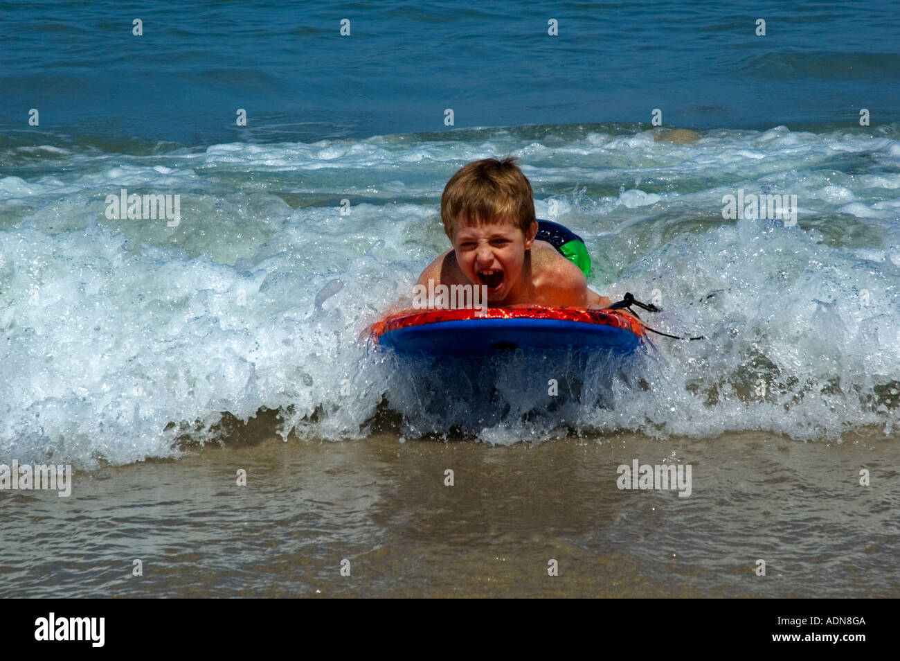 Little boy in sea hi-res stock photography and images - Alamy