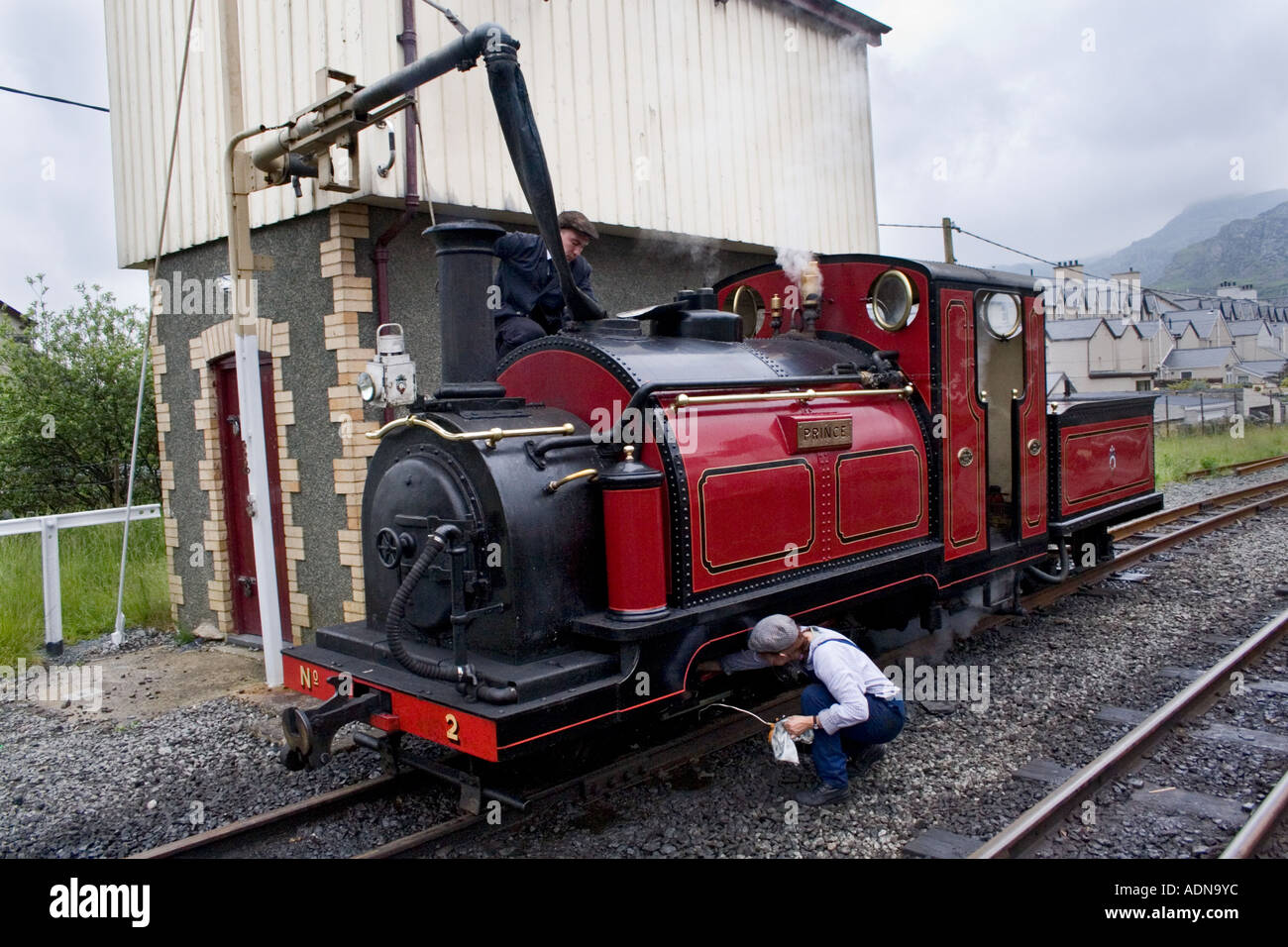 Steam engine taking water railway hi-res stock photography and images ...
