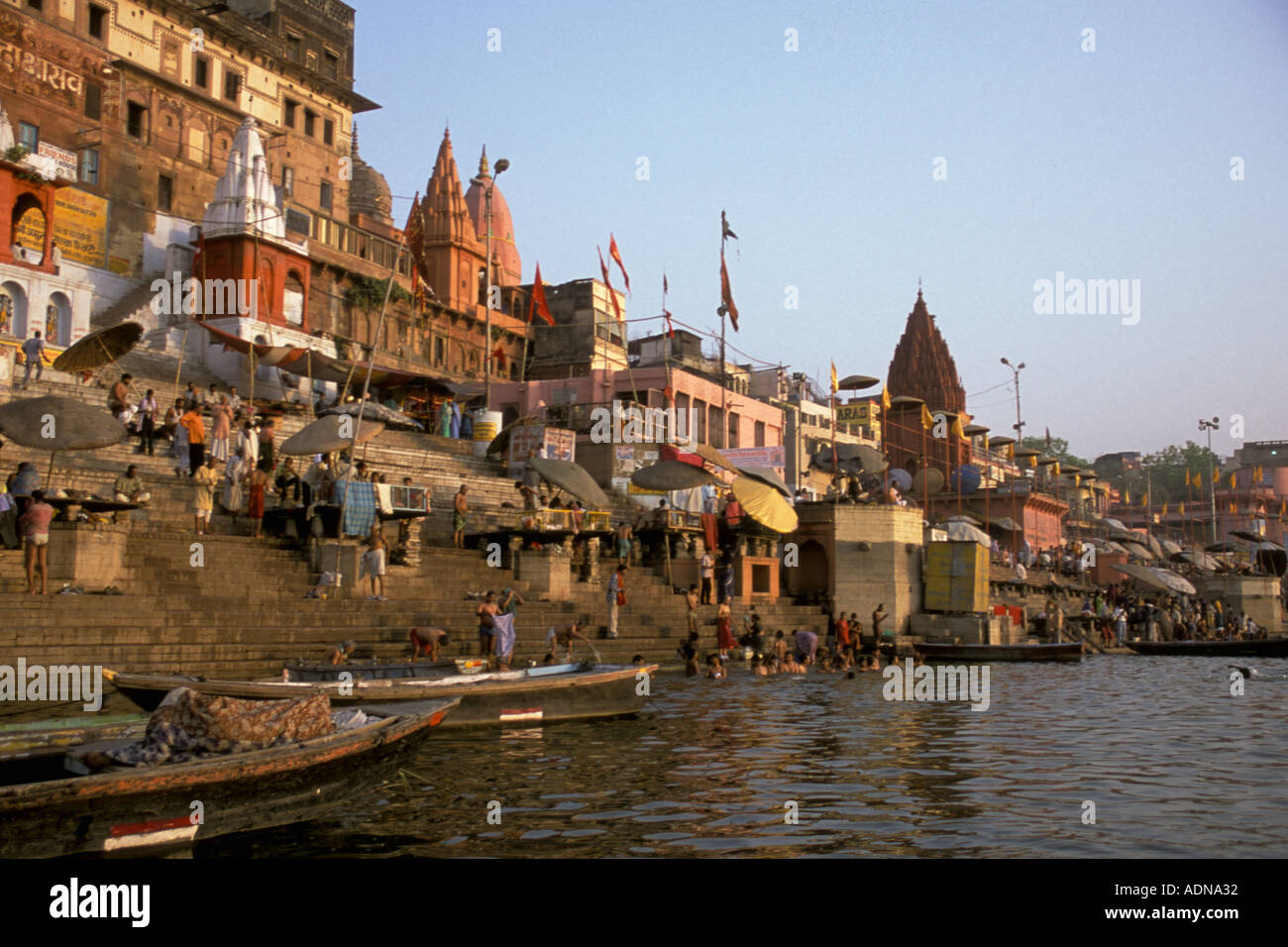 India Uttar Pradesh Varanasi Ganges River ghats early morning bathers ...