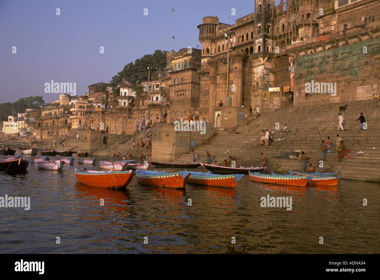 India Uttar Pradesh Varanasi Ganges River ghats early morning bathers ...