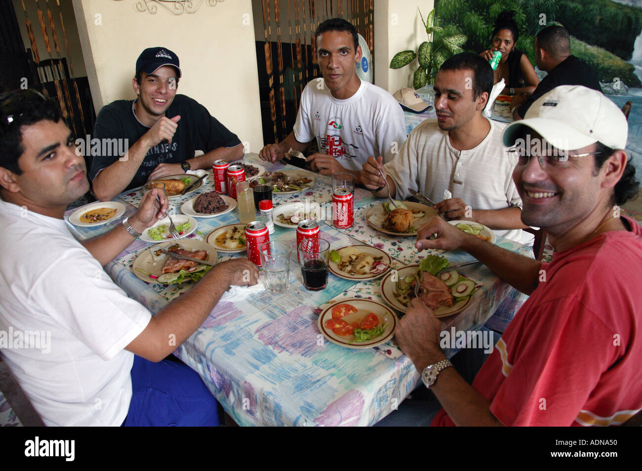 Group men eating in private hi-res stock photography and images - Alamy
