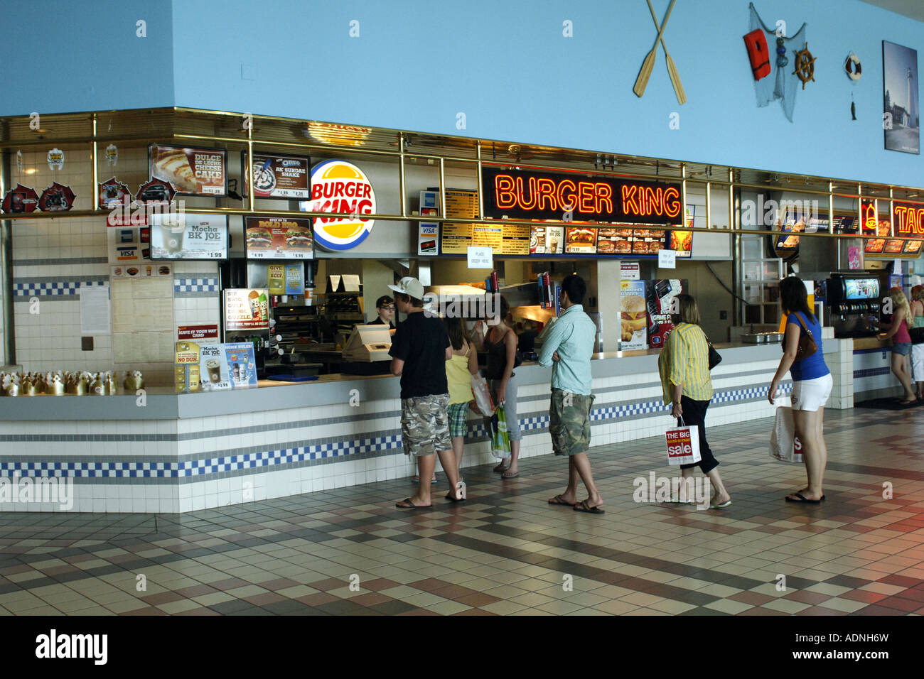 People lining up to purchase food inside a shopping mall Stock Photo ...