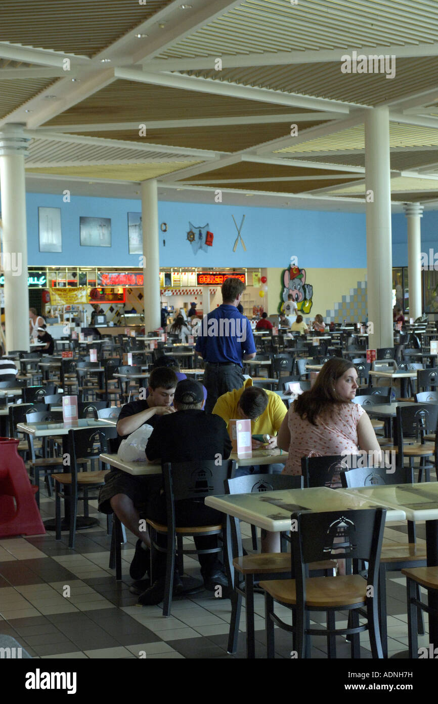 People sitting eating food inside a shopping Mall restaurant Stock ...