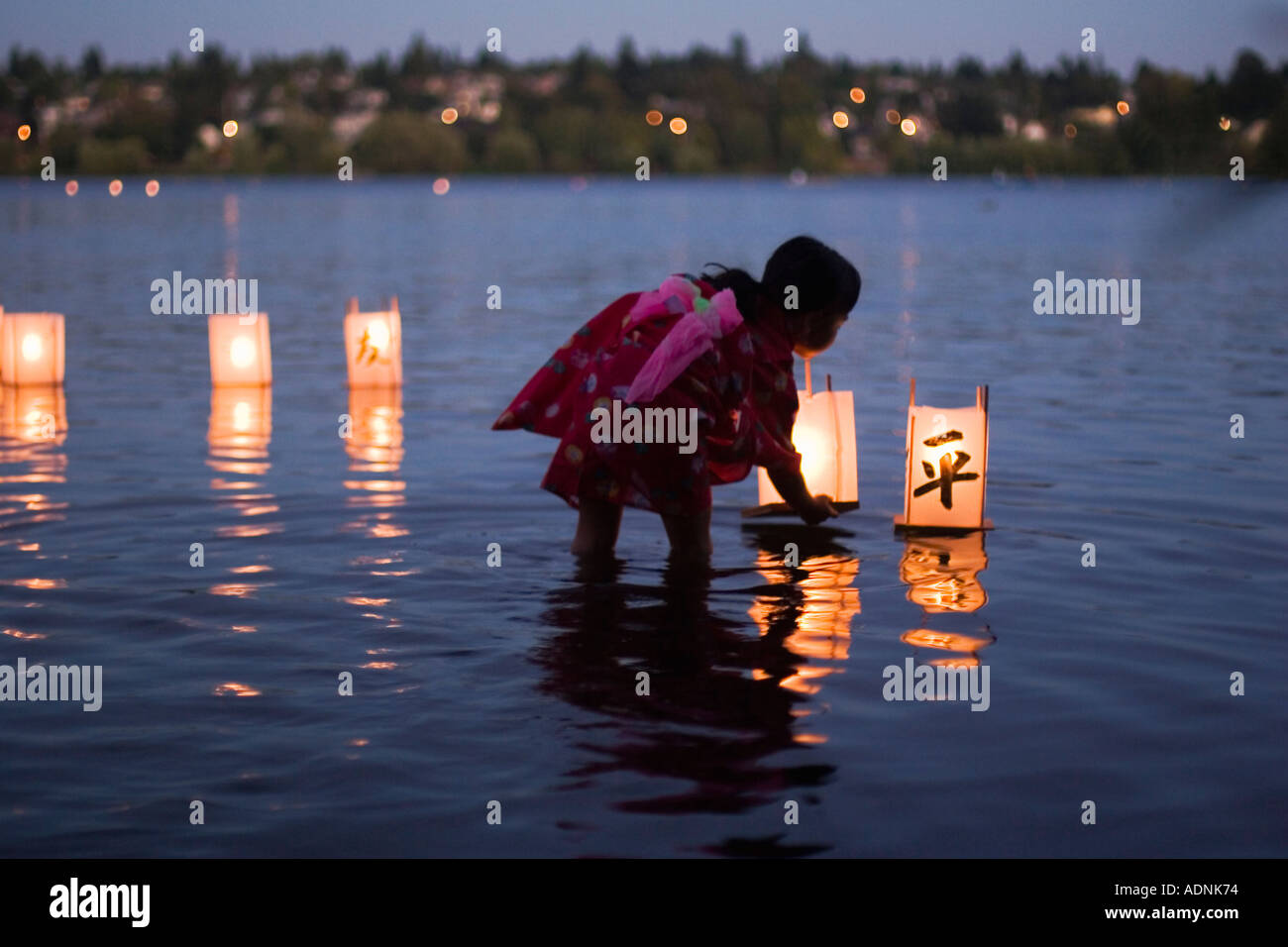 Toro Nagashi lantern floating ceremony in remembrance of the victims of ...