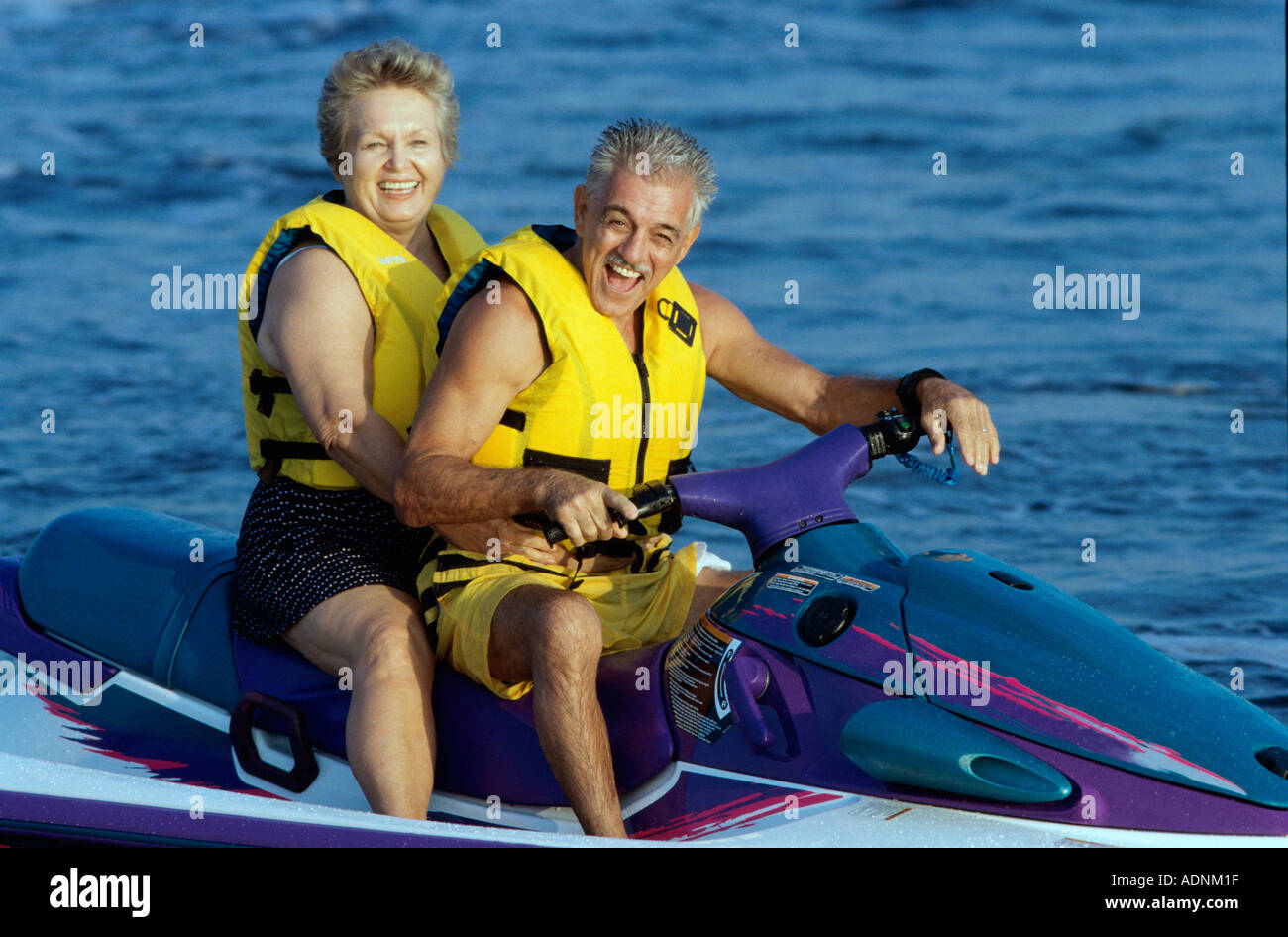 Three people riding jet ski hi-res stock photography and images - Alamy