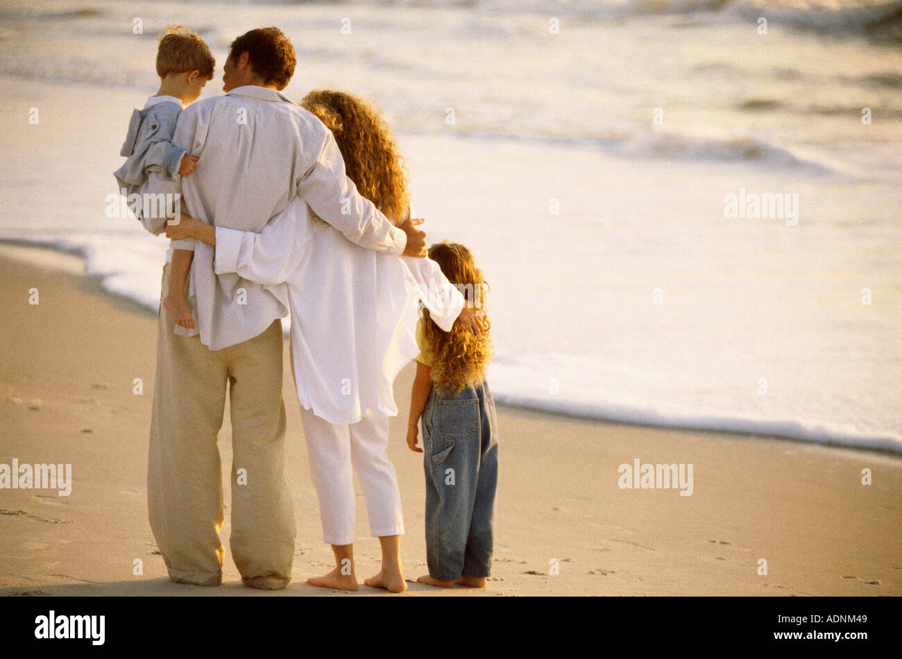 Brother sister hugging rear view hi-res stock photography and images ...