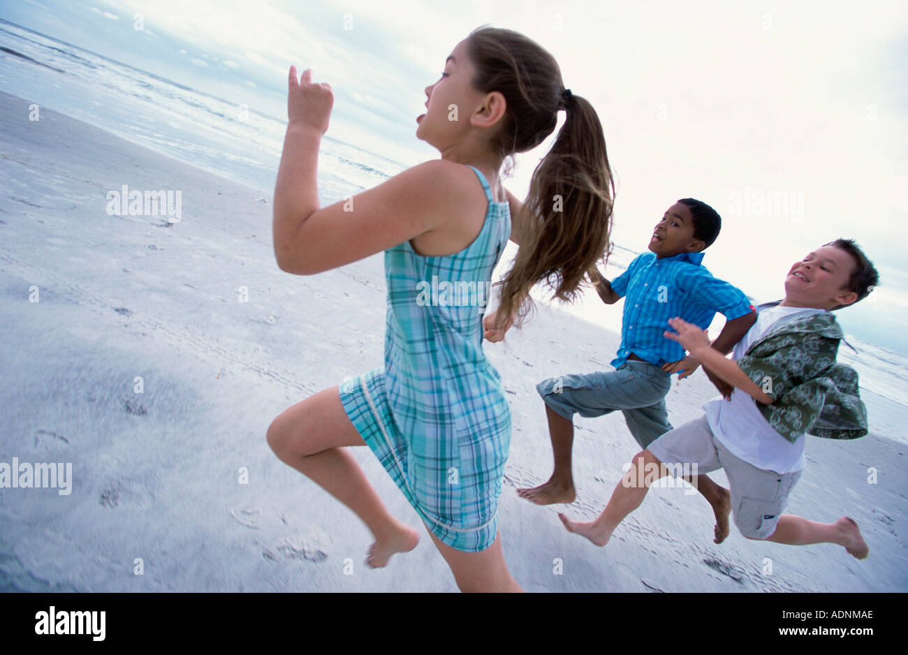 Side profile two boys running hi-res stock photography and images - Alamy