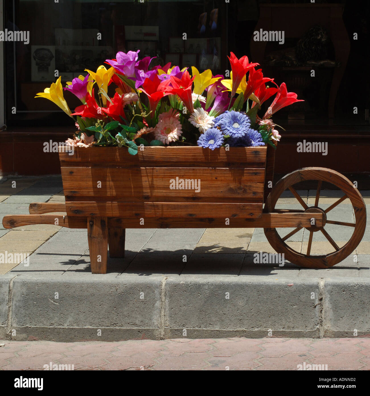 Wheelbarrow With Colourful Flowers High Resolution Stock Photography ...