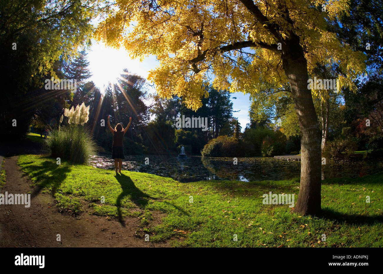 Woman praying outdoors Stock Photo - Alamy