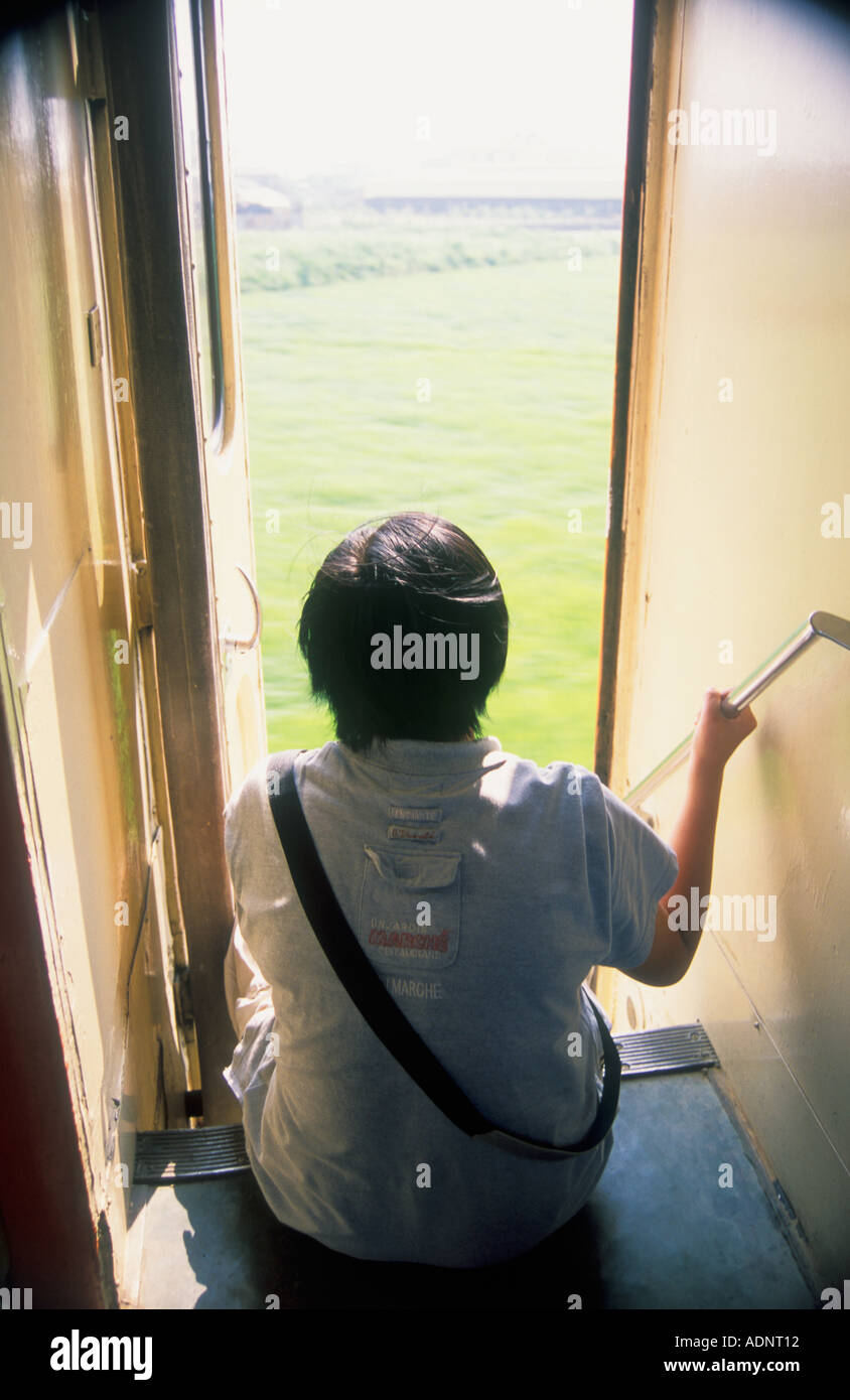 People looking out train door hi-res stock photography and images - Alamy