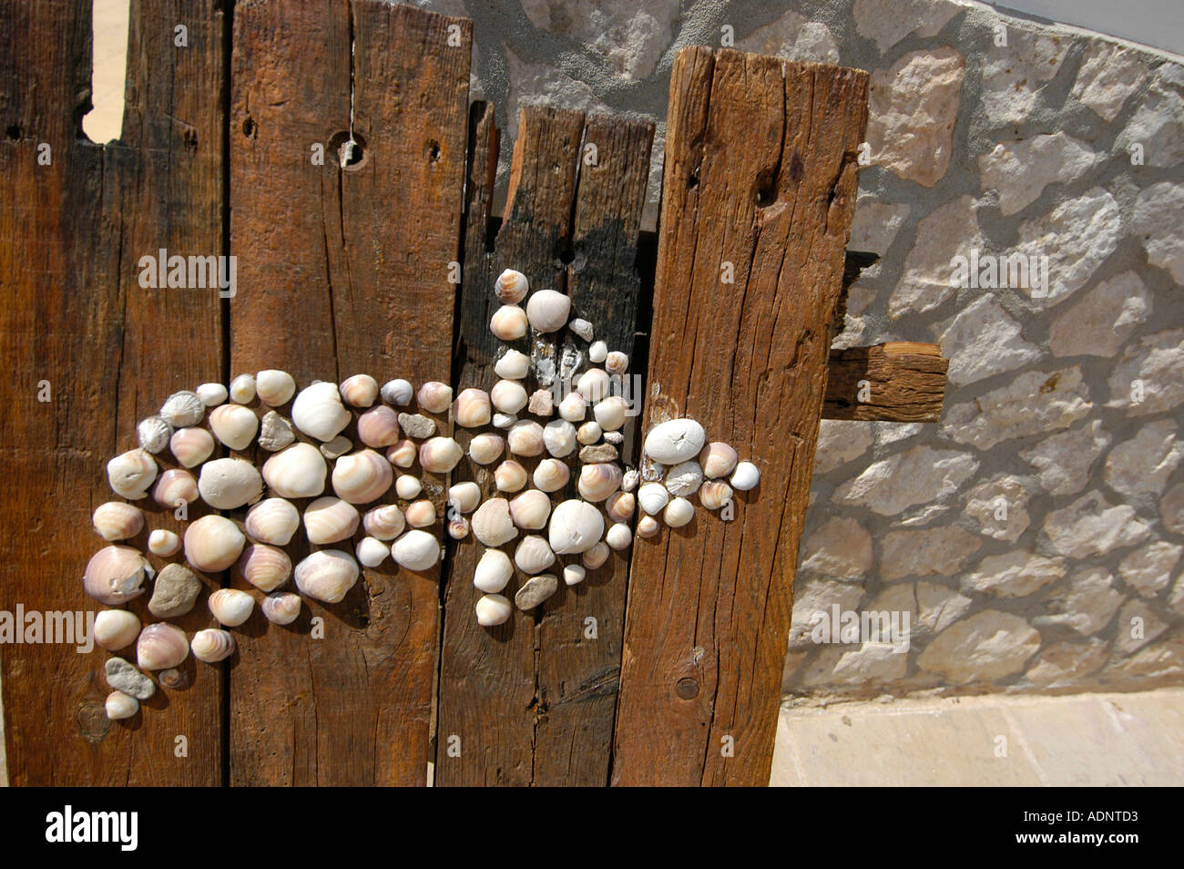 Curious arrow indicating sign made of shells Formentera Balearic ...