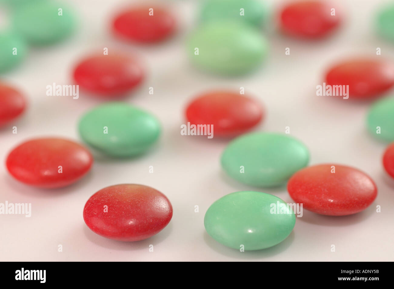 Red and green integrated smarties Stock Photo - Alamy