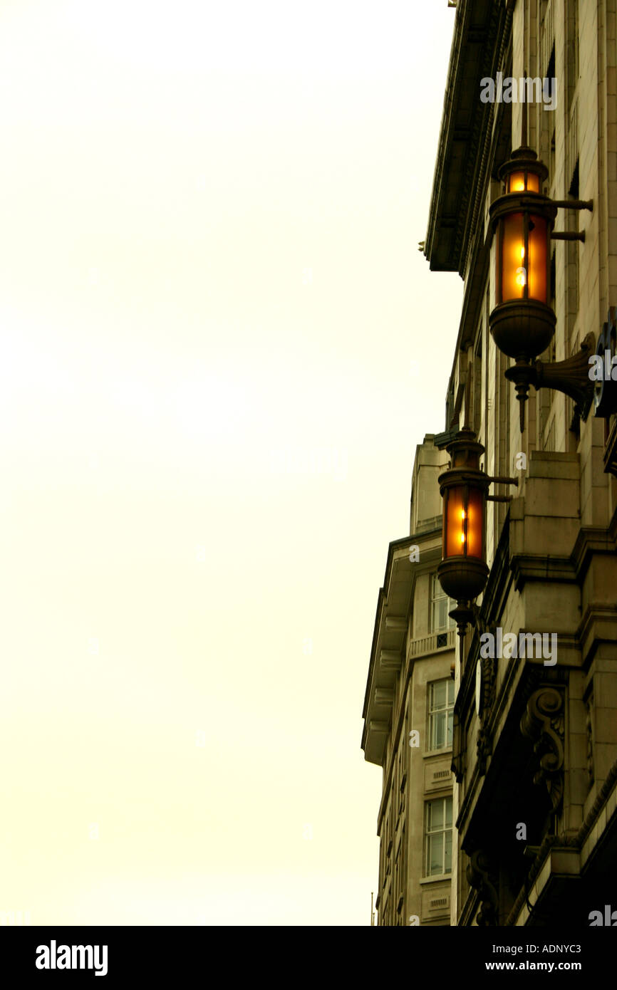 London Lanterns on the side of old building The Strand London UK Stock ...