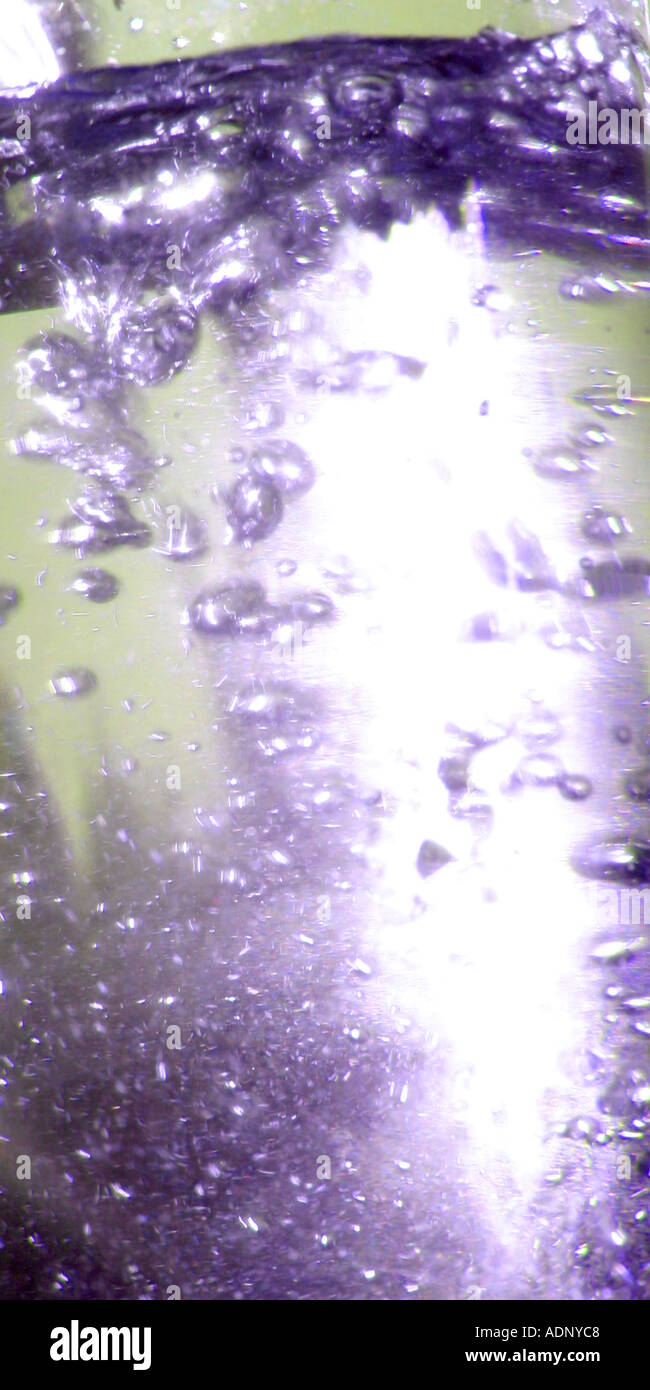 Purple pouring water Stock Photo - Alamy