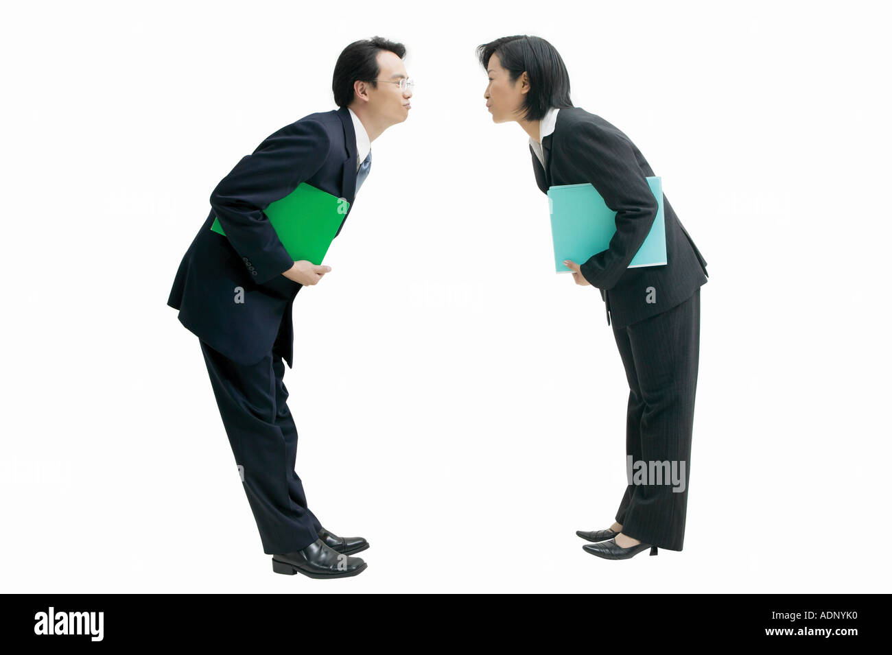 Asian business people bowing hi-res stock photography and images - Alamy