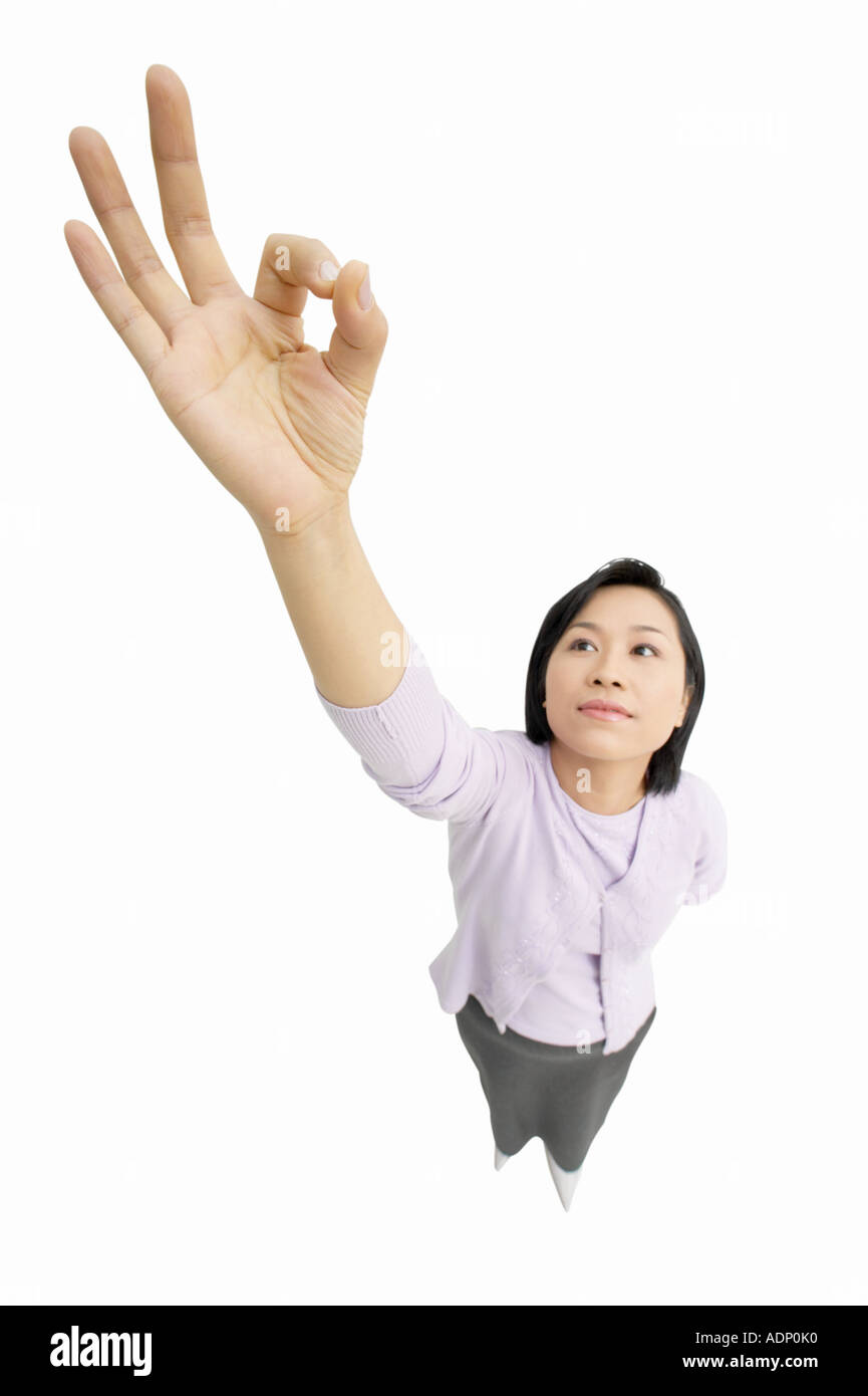 Hand signals woman Cut Out Stock Images & Pictures - Alamy