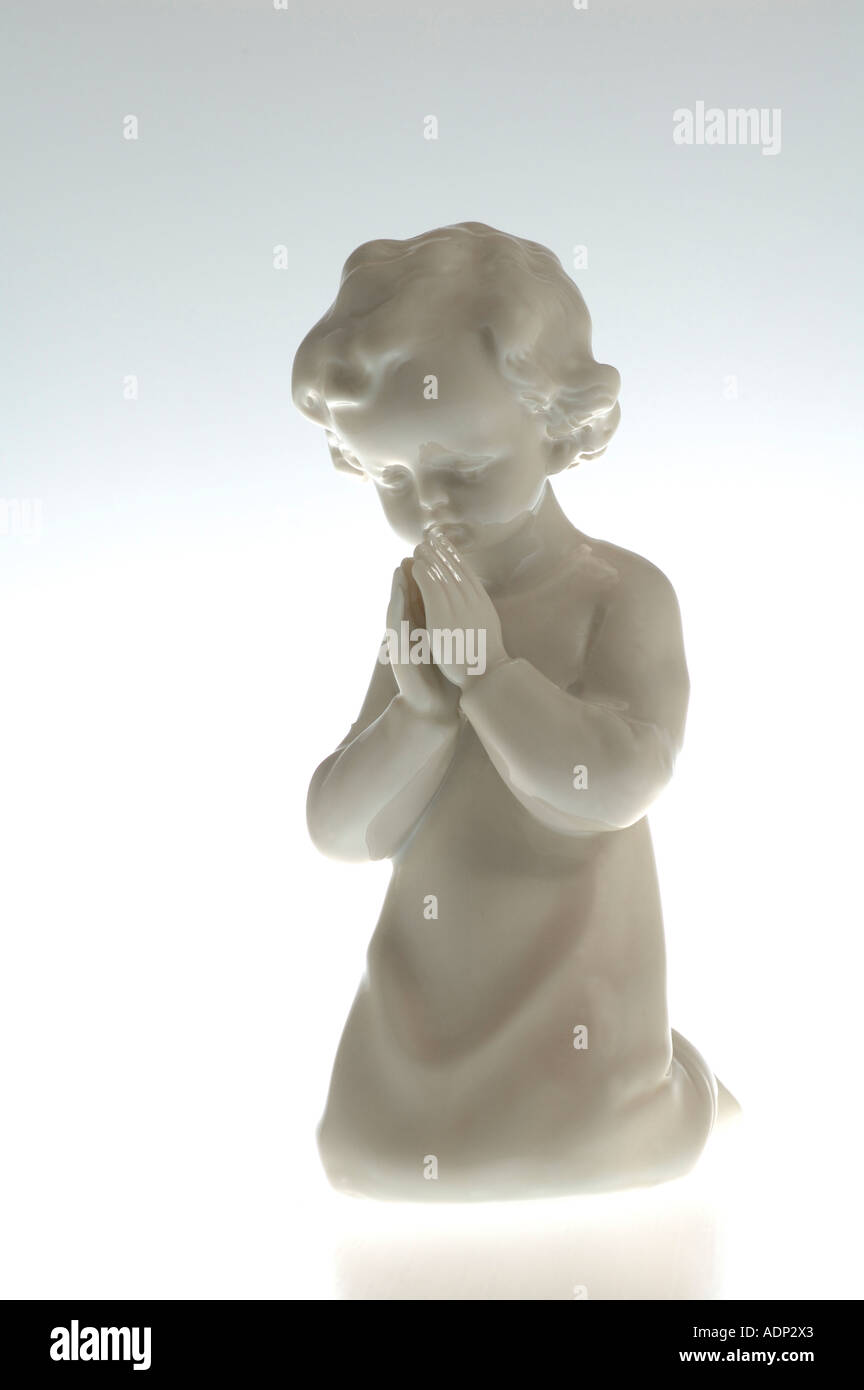 Figure of a praying angel Stock Photo - Alamy